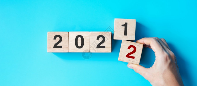 20年表格背景说明计划审查目标开始和新年假日概念上的案文手持木板块桌子翻动结尾高清图片下载-正版图片307831797-摄图网