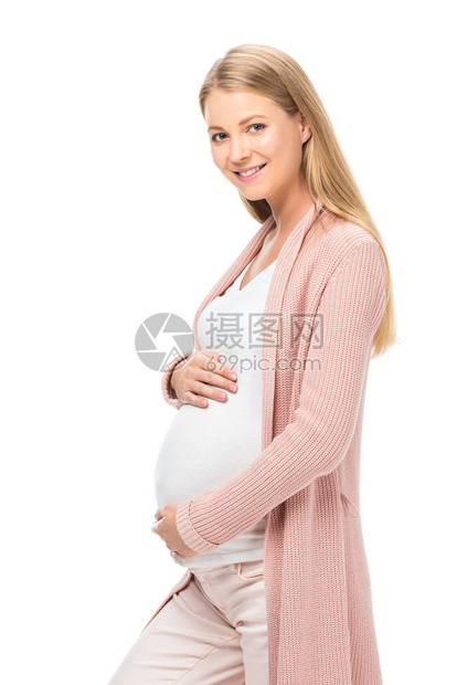 孕妇抚摸肚子微笑和看着在白色上被高清图片下载 正版图片502712180 摄图网