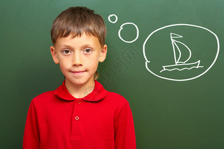 聪明男孩的肖像一边看一边一高清图片下载-正版图片503602100-摄图网