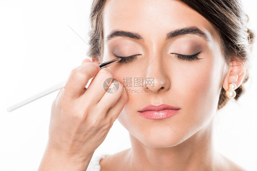 化妝師畫眼箭而化妆模型则孤立在白色上高清图片下载 正版图片503355682 摄图网
