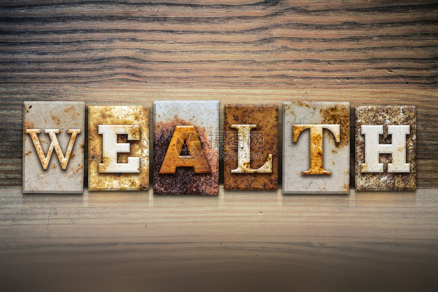 WEALTH这个词是用生锈的金属纸质印刷型高清图片下载-正版图片503567853-摄图网