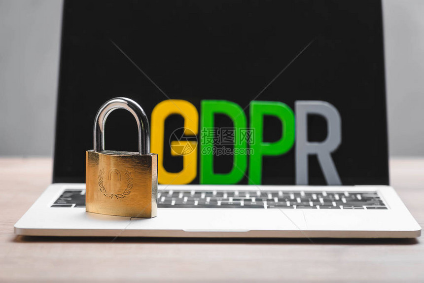 笔记本电脑上的金属锁和gdpr字母高清图片下载-正版图片503977054-摄图网