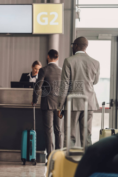 在柜台的机场检查车站对列队商务高清图片下载-正版图片505085673-摄图网