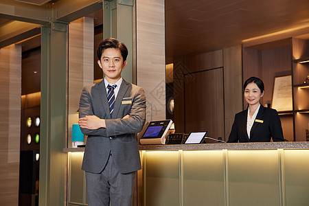 快捷酒店大厅前台服务人员工作形象高清图片下载-正版图片506956762-摄图网