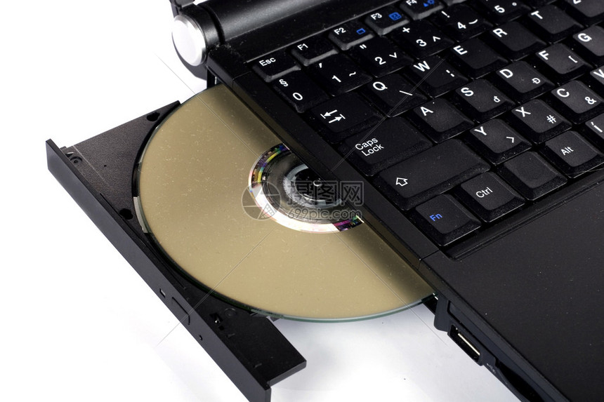 从笔记本电脑和CDROM及DVDRom阅读高清图片下载-正版图片506965761-摄图网