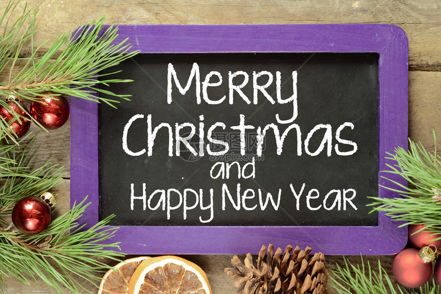 写着圣诞快乐和新年快乐的手写作高清图片下载-正版图片507152811-摄图网